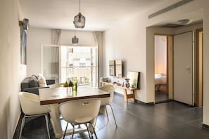 Apartamento | Sala de estar | Smart TV de 40 polegadas com canais digitais, televisor