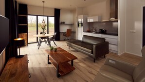 Uma sala de estar moderna com sofá, mesa de centro e televisão. Há uma área de jantar com mesa e cadeiras. O quarto possui uma grande janela e uma cozinha com armários e eletrodomésticos.