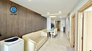 Apartamento Deluxe | Sala de estar