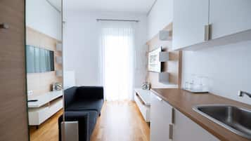 Suite Sénior | 1 quarto, cofre no quarto, secretária