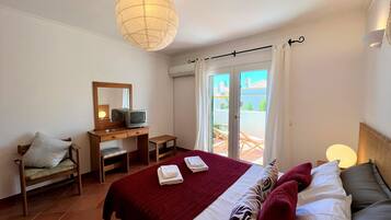 Apartamento, 2 quartos, acesso à piscina | 2 quartos, roupa de cama fornecida