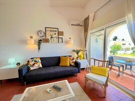 Apartamento, 1 quarto, terraço | Sala de estar