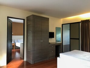 Quarto família | Frigobar, cortinas blackout, ferros/tábuas de passar roupa