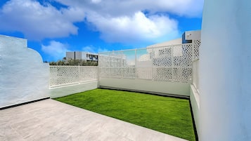 Apartamento superior | Terraço/pátio