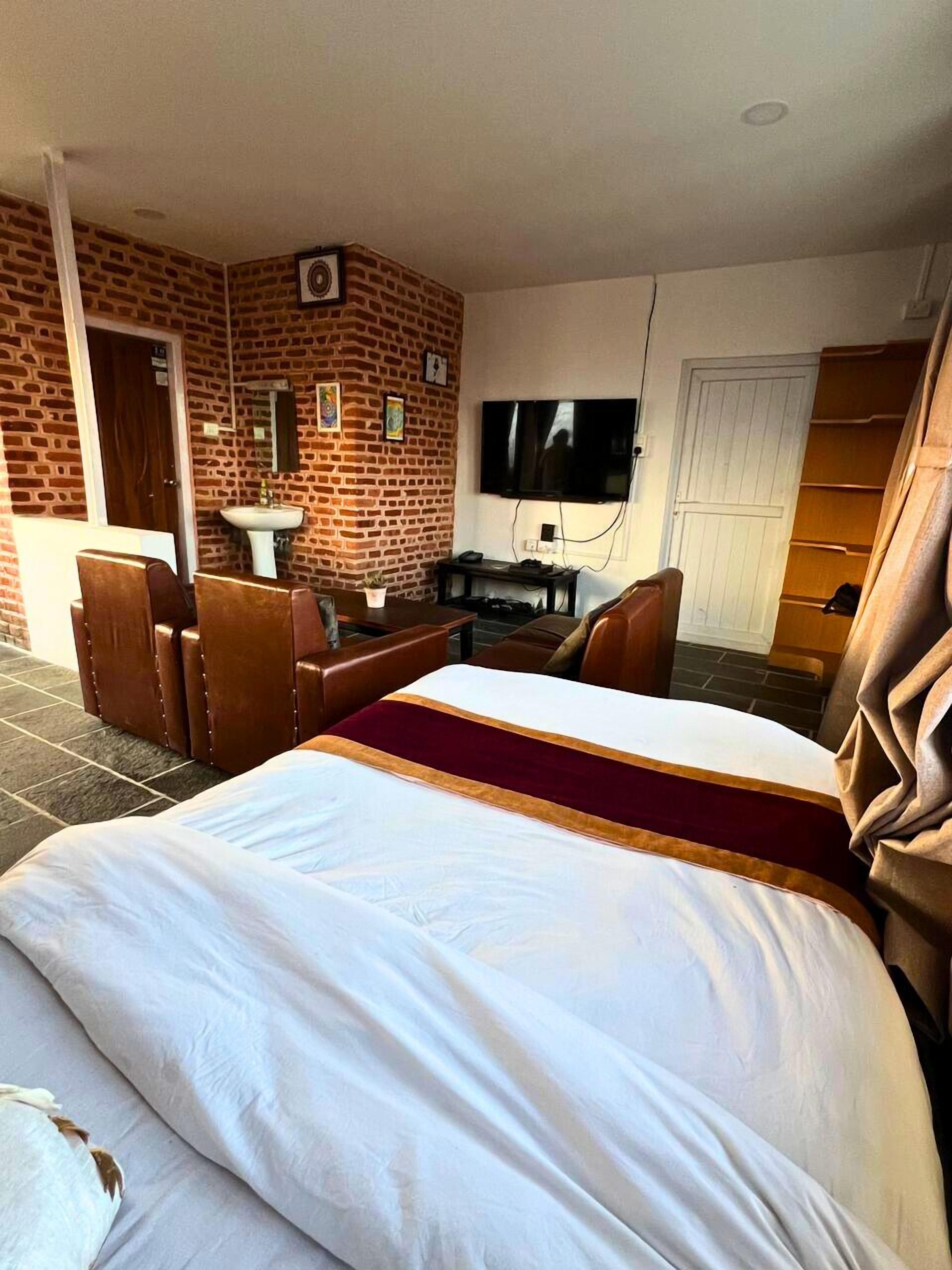 Suite Familiar | Minibar, cofre no quarto, secretária 