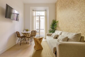 Apartamento Standard | Sala de estar | Smart TV de 40 polegadas com canais via satélite 