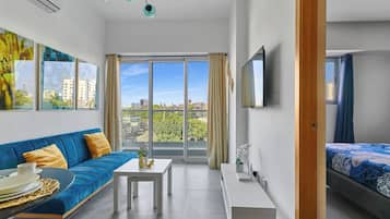 Apartamento premium | Área de estar | Smart TV