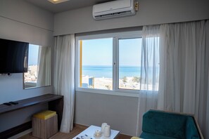 Quarto superior | Área de estar | Smart TV 42 polegadas com canais via satélite