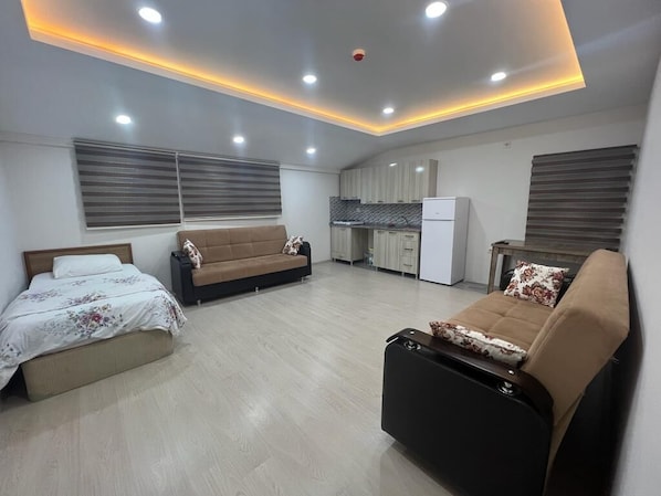 Apartamento básico | Cozinha privada | Frigobar, fogão, cooktop, chapa