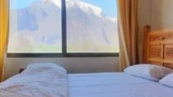 Quarto casal luxo | Vista para a montanha