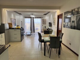 Quarto conforto | Área de estar