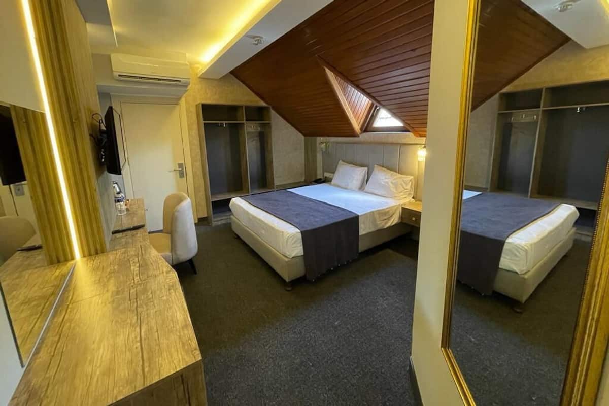 Quarto Standard | Roupa hipoalergénica, minibar, cofre no quarto 
