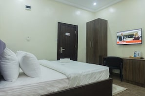 Quarto Individual Executivo | Secretária, Wi-fi grátis, roupa de cama fornecida 