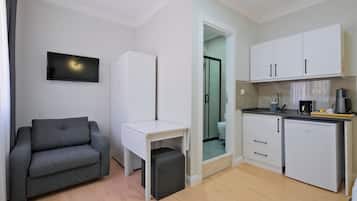Suíte estúdio luxo, 1 cama Queen e sofá-cama | Cozinha privada | Geladeira, micro-ondas, cooktop, chaleira elétrica