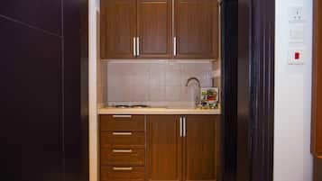 Apartamento, 2 quartos | Cozinha privada | Frigobar, chaleira elétrica