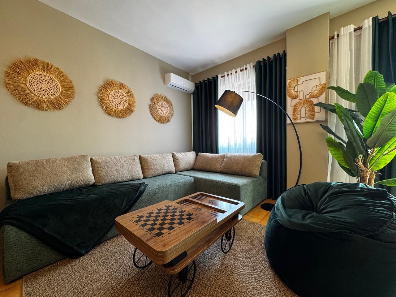 Apartamento Panorâmico | Sala de estar | Smart TV de 55 polegadas com canais por cabo 