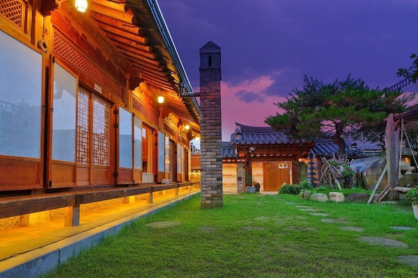 Usu | Vista para o jardim