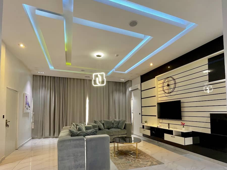 Suite Familiar, 2 quartos, Vista para a cidade | Sala de estar | TV de ecrã plano, consola de videojogos, Netflix, leitor de DVD