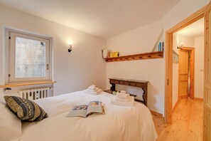 Apartamento Familiar, vários quartos (Appartamento La Marmotta Mountain) | 2 quartos, Wi-fi grátis, roupa de cama fornecida 
