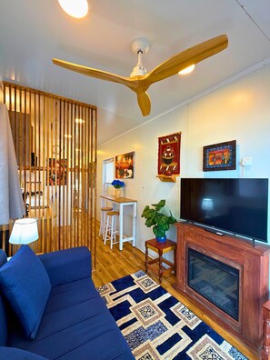 TV de ecrã plano, Netflix, Hulu, base para iPod 