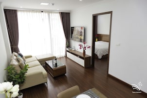 Quarto duplo família, 2 quartos, vista para a cidade | Área de estar