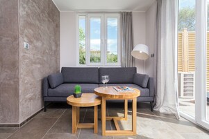 Estúdio Comfort | Sala de estar | TV de ecrã plano 