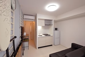 Apartamento conforto | Área de estar | TV de tela plana