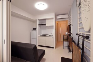 Apartamento conforto | Área de estar | TV de tela plana
