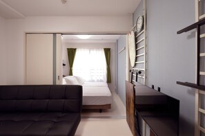 Apartamento conforto | Área de estar | TV de tela plana