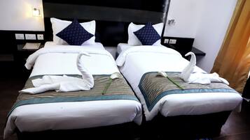 Quarto Deluxe | 1 quarto, roupa de alta qualidade, minibar, com decoração personalizada