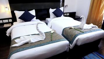 Quarto luxo | 1 quarto, roupas de cama premium, frigobar, individualmente decorados