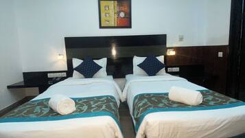 Quarto luxo | 1 quarto, roupas de cama premium, frigobar, individualmente decorados