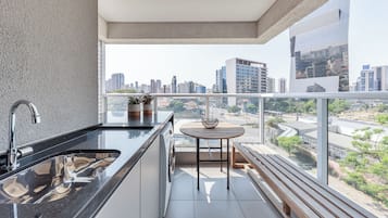Apartamento empresarial | Área de estar | Smart TV 32 polegadas com canais digitais