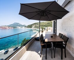 Penthouse Premium, 1 cama king-size e sofá-cama, vista para o mar | Terraço/pátio interior