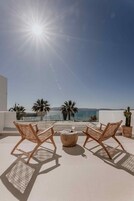 Suíte superior, vista para o mar | Terraço/pátio
