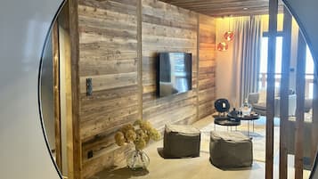 Apartamento premium | Área de estar | Smart TV, pisos aquecidos, escritórios