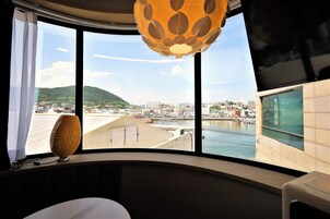 Quarto Deluxe, vista para o oceano | Cortinas/cortinados opacos, Wi-fi grátis 