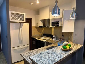 Casa Del Valle Apartment A1 | Cozinha privada | Geladeira grande, micro-ondas, chapa