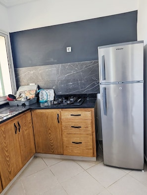 Apartamento, 2 quartos, sacada, vista para o jardim | Cozinha privada