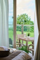 Apartamento de Luxo em Condomínio Fechado | 2 quartos, secretária, Wi-fi grátis 