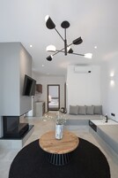 Thalassa Suite | Sala de estar | Smart TV 