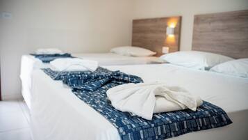 Quarto Triplo | Quartos insonorizados, Wi-fi grátis, roupa de cama fornecida