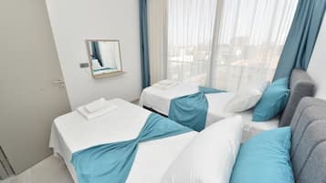2 quartos, roupas de cama premium, escrivaninha