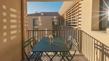 Apartamento superior | Terraço/pátio