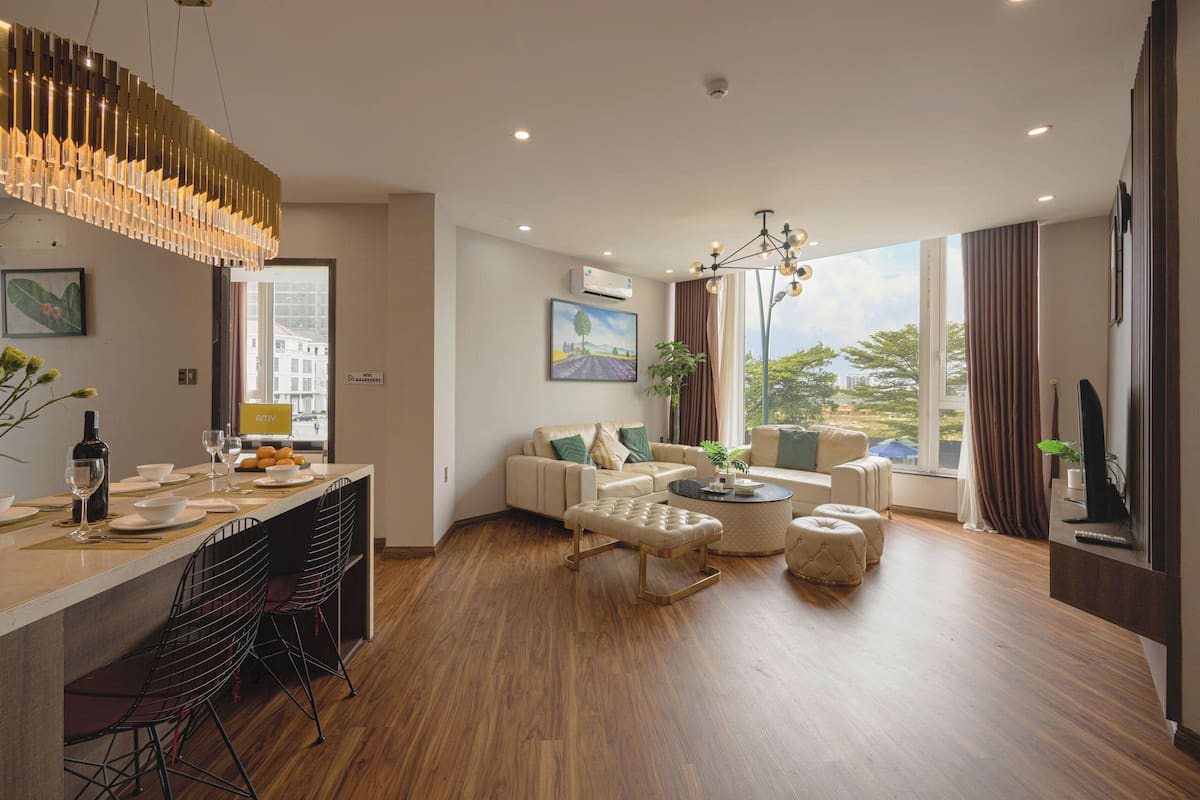 Apartamento, 4 quartos, vista para a cidade | Área de estar | TV de tela plana 40 polegadas com canais a cabo