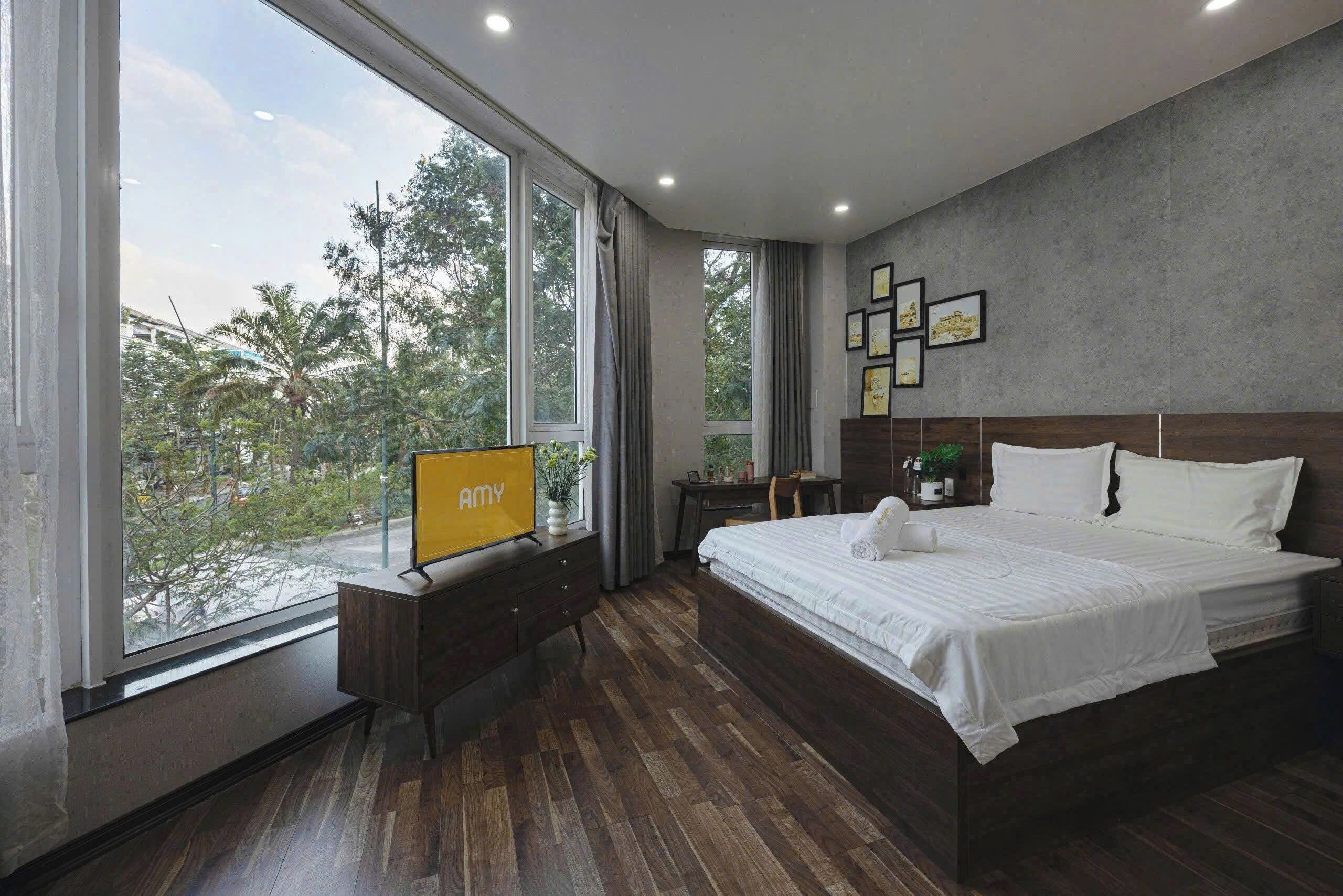 Apartamento, 2 quartos, Vista para a cidade | Roupa de alta qualidade, minibar com produtos grátis, secretária 