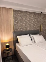 Apartamento superluxo | 1 quarto, roupas de cama antialérgicas, camas com colchões pillow-top