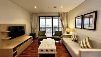 Apartamento Panorâmico | Sala de estar | Smart TV de 55 polegadas com canais digitais, Netflix