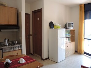 Apartamento, 1 quarto, varanda, Vista para a cidade | Sala de jantar