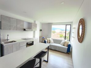Apartamento família | Área de estar